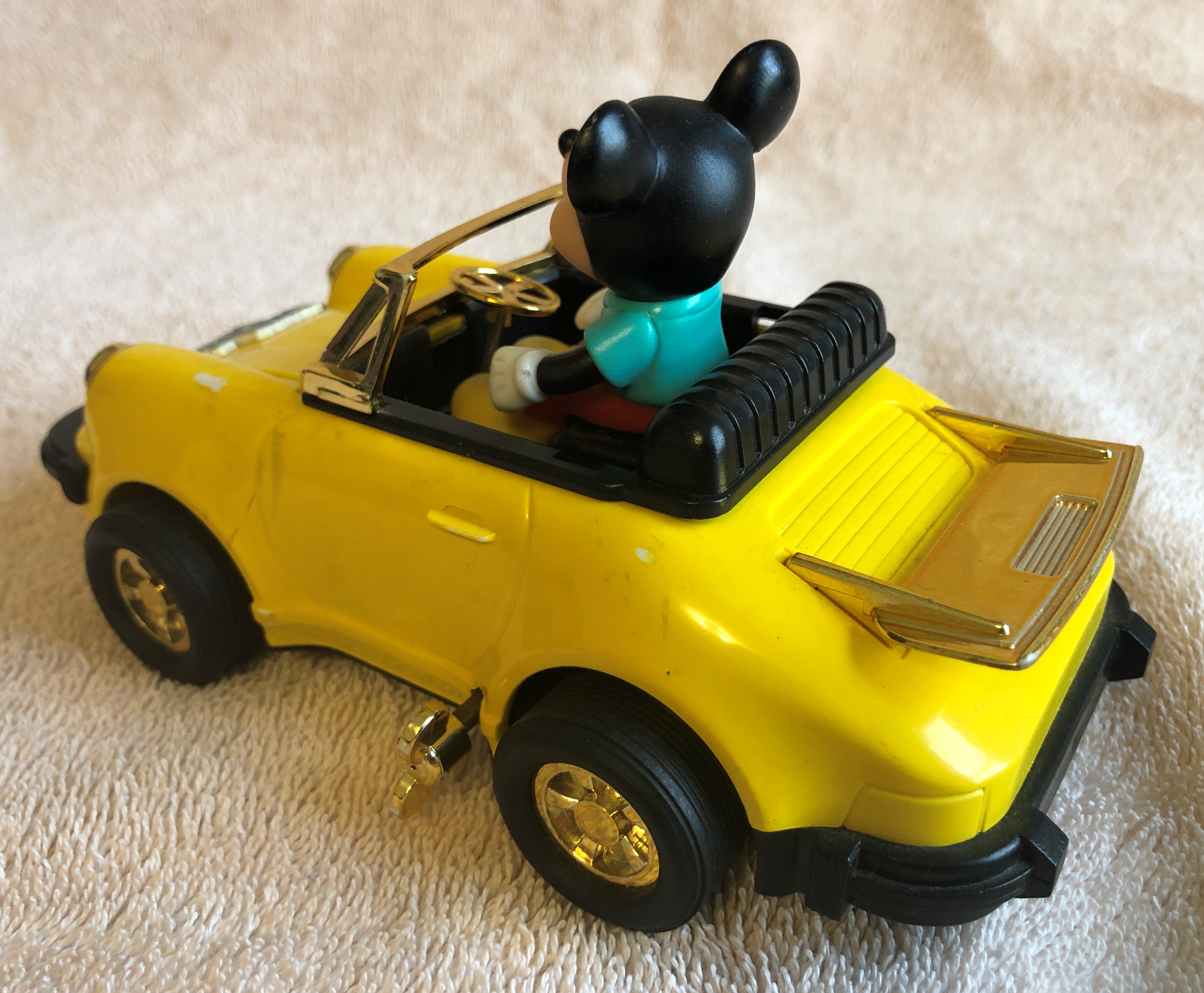 Mickey Mouse Races into 2021 in a Porsche | Disleelandia